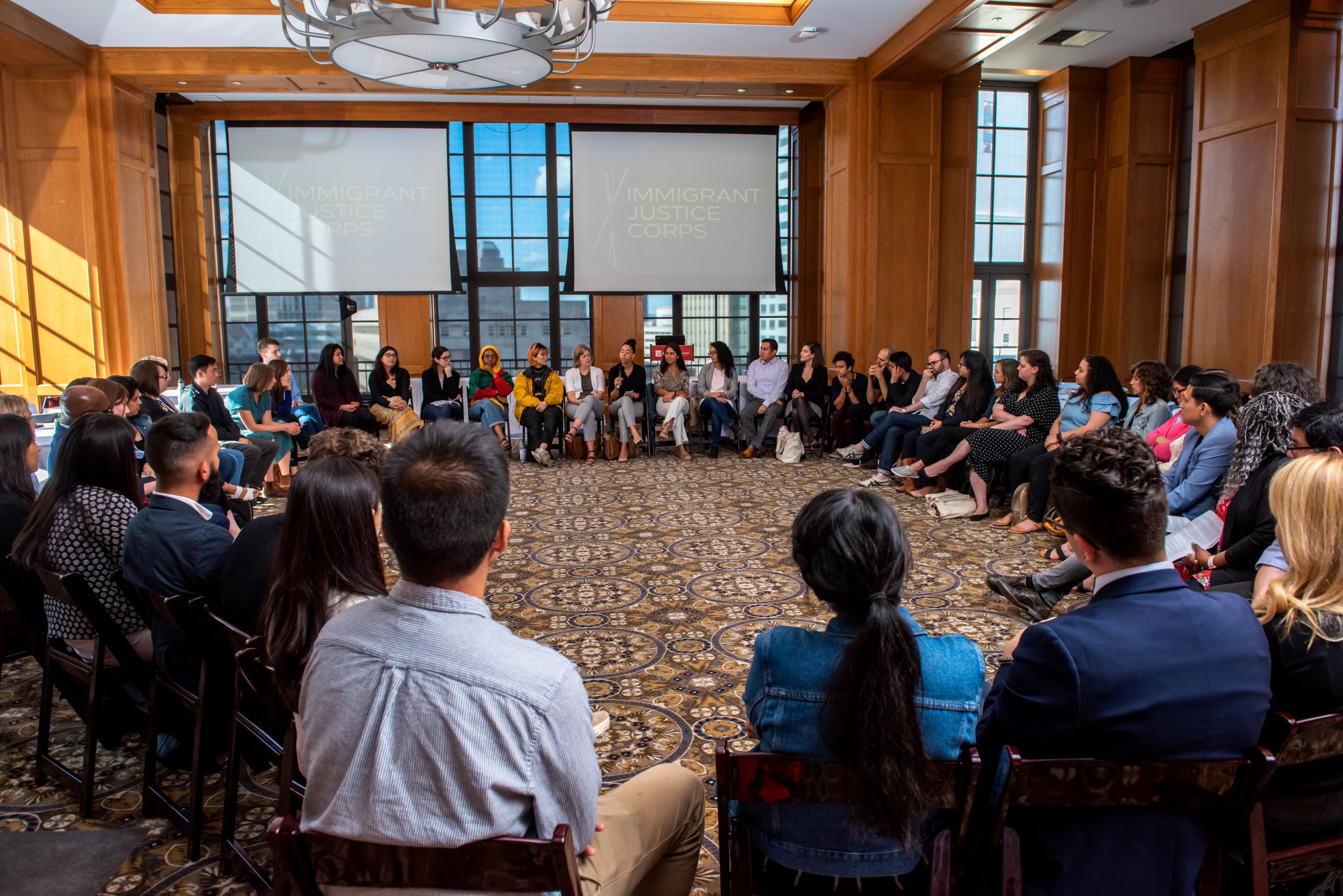 Bringing Together Our Vibrant Community - Immigrant Justice Corps